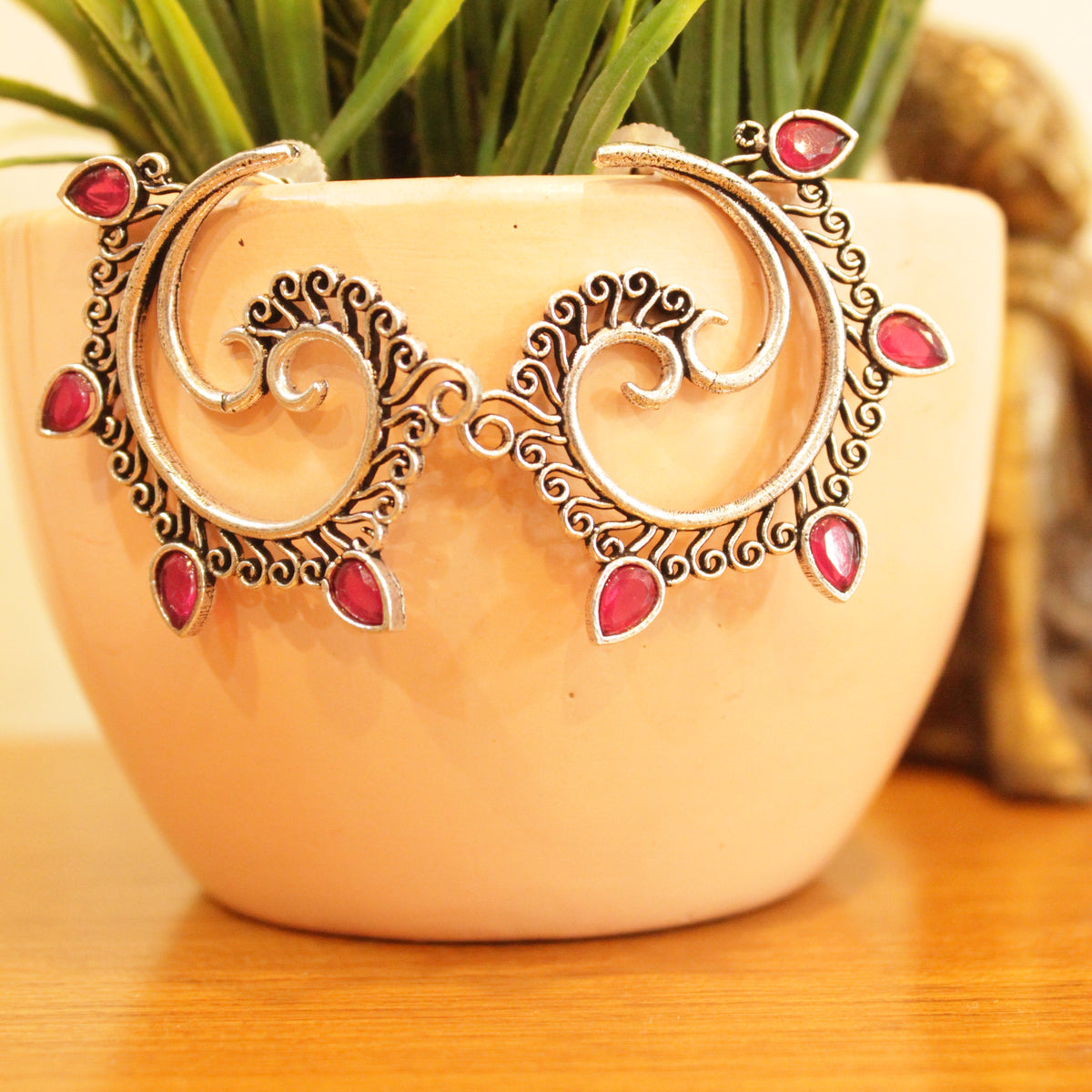 Fuchsia Stones Embedded Oxidised Finish Spiral Peacock Earrings – A ...