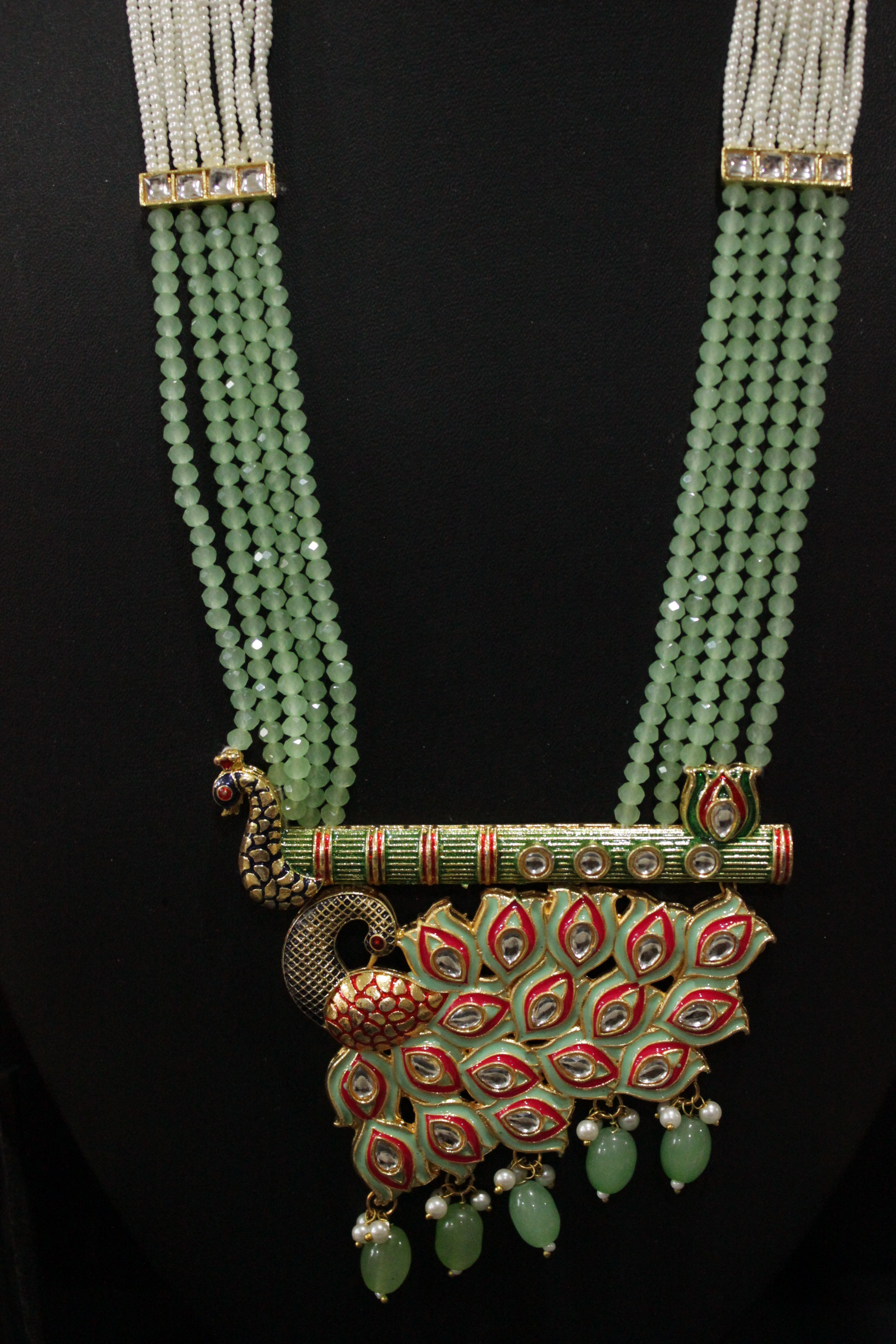Kundan Stones Embedded Enamel Painted Peacock and Bansuri Motif Pendan ...